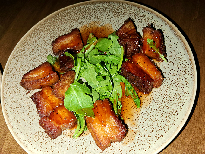 Pork belly that's achieved that magical state where crispy exterior meets melt-in-your-mouth interior &ndash; the unicorn of meat preparations.