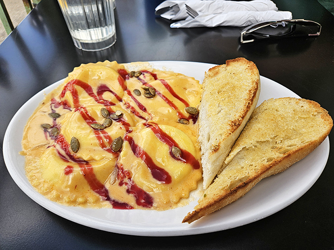 These ravioli, dressed in their berry-striped finery, aren't just pasta—they're little envelopes delivering joy directly to your soul.
