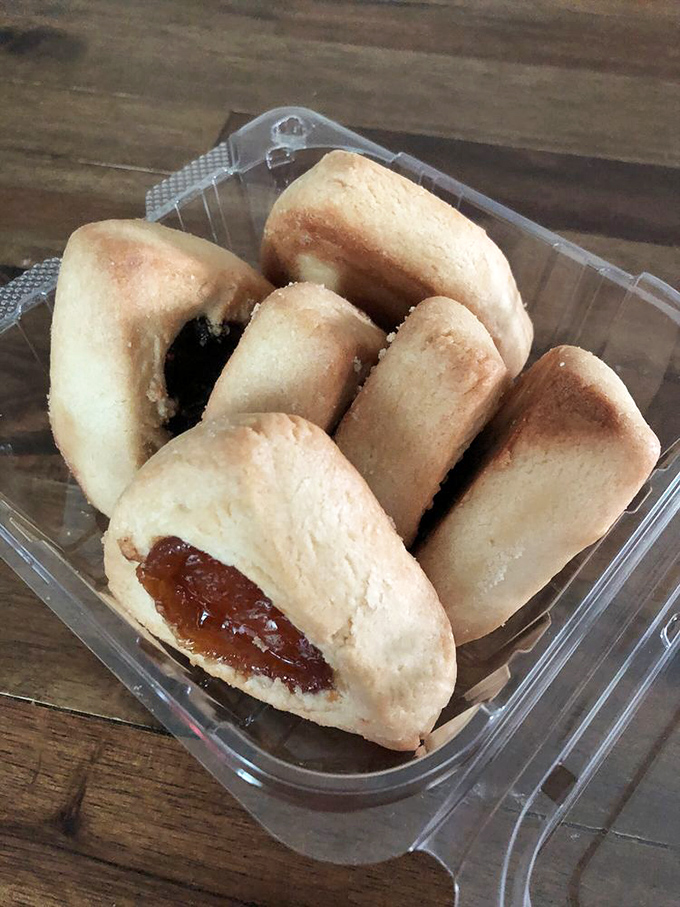 These rugelach pastries curl into themselves like they're hiding delicious secrets. Spoiler alert: they absolutely are.