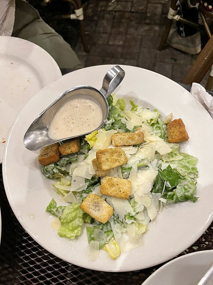 A proper Caesar salad is an art form. This one, with its house-made dressing and golden croutons, proves simplicity is the ultimate sophistication.