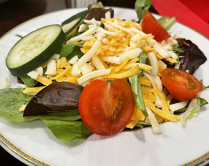 Even the side salad gets special attention – a colorful supporting actor that brings freshness to balance the richness of the main attractions.