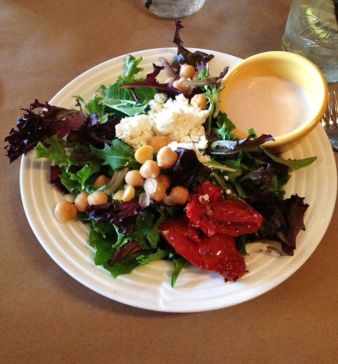 Even the salad gets special treatment here&mdash;fresh greens, chickpeas, and roasted peppers proving vegetables can hang with the big meaty players.