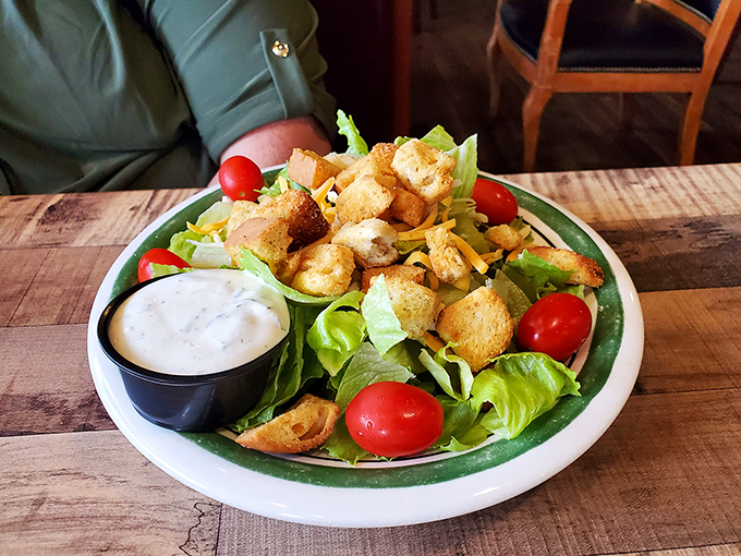 Even the salad looks inviting, with fresh greens, cherry tomatoes, and house-made croutons that didn't come from a box sometime last century.