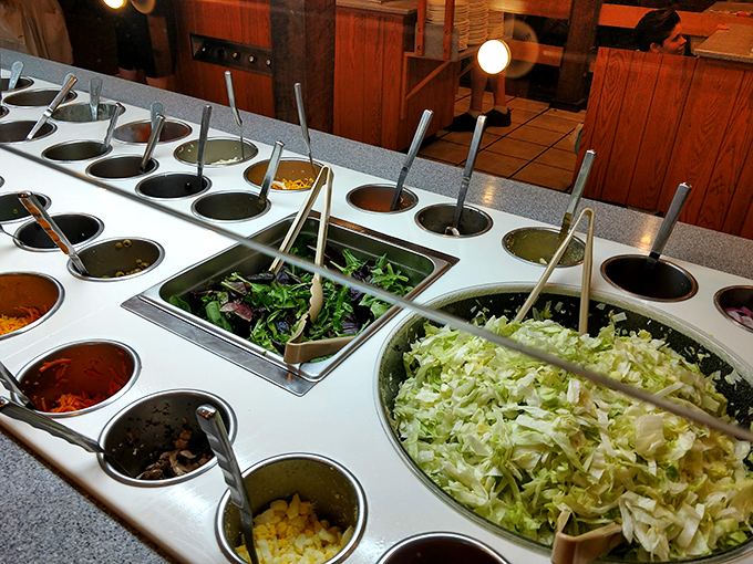 The salad bar &ndash; where good intentions meet temptation, and "just a little bit of everything" becomes a structural engineering challenge.