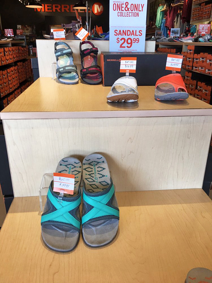 Merrell's outdoor sandal display proves that practical footwear can still make your beach-loving heart skip a beat.