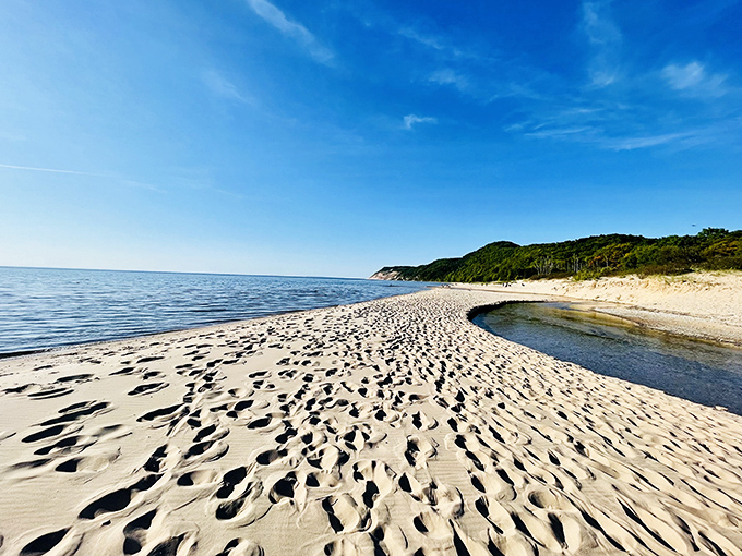 Where Otter Creek meets mighty Michigan. This sandy confluence creates nature's perfect wading pool for reluctant swimmers and brave toddlers alike.
