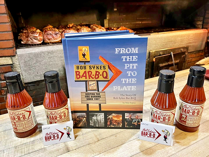 Their cookbook and sauce bottles aren't just merchandise—they're take-home insurance policies against barbecue withdrawal symptoms.