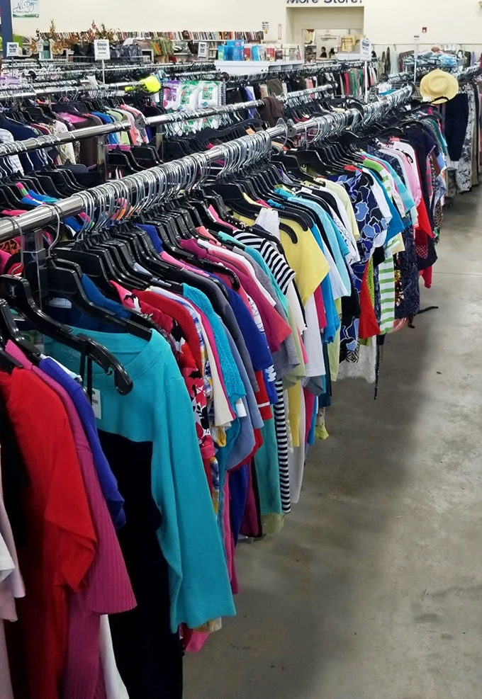 Fashion's democracy on display&mdash;where designer labels and everyday basics hang side by side in chromatic harmony.