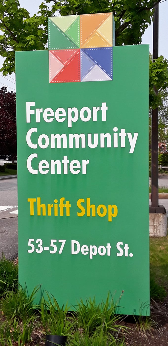 The colorful quilt-inspired sign stands as a beacon of community spirit&mdash;like a lighthouse for bargain hunters navigating Freeport's retail waters.