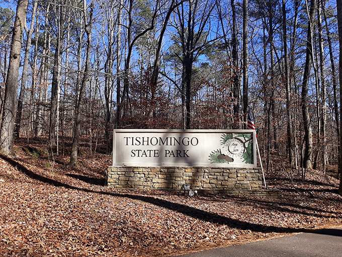 The park's entrance sign doesn't need neon or flashing lights &ndash; the real show begins just beyond this understated welcome.