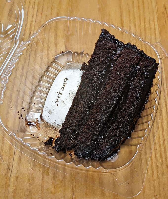 Chocolate cake so dense it has its own gravitational pull. The perfect sweet finale to a sandwich pilgrimage.