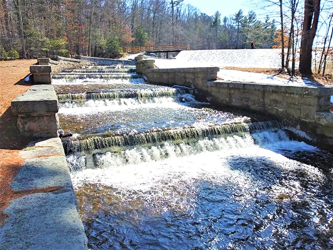Water choreography at its finest&mdash;the spillway creates a mesmerizing cascade that sounds like nature's version of a meditation app.