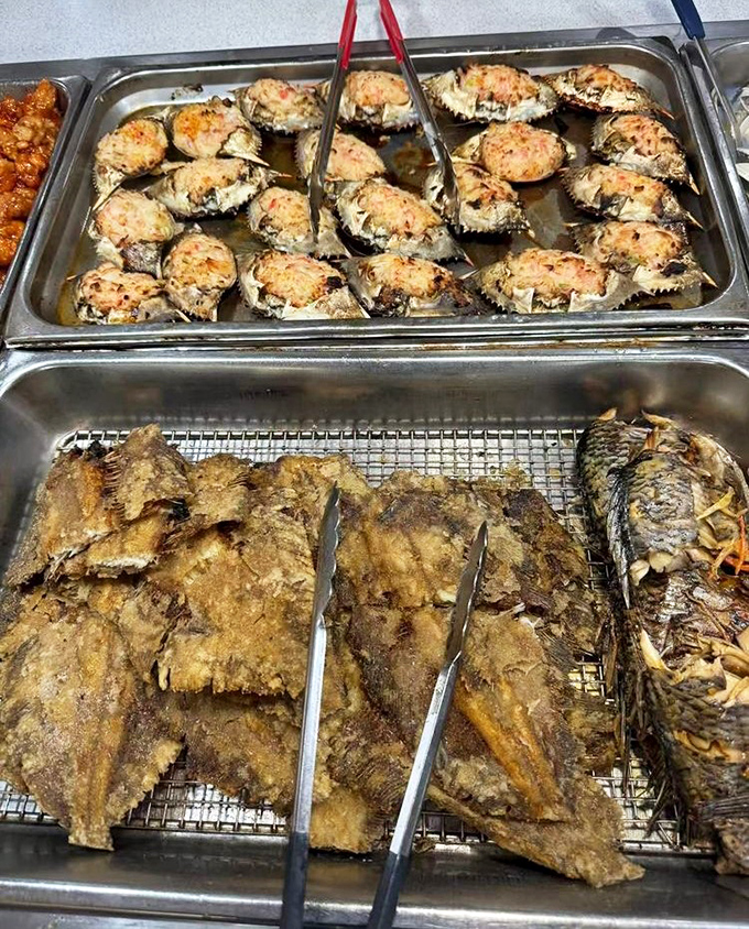 These stuffed crabs and fried fish fillets are ready for their close-up. Perfectly golden and waiting to make your acquaintance.