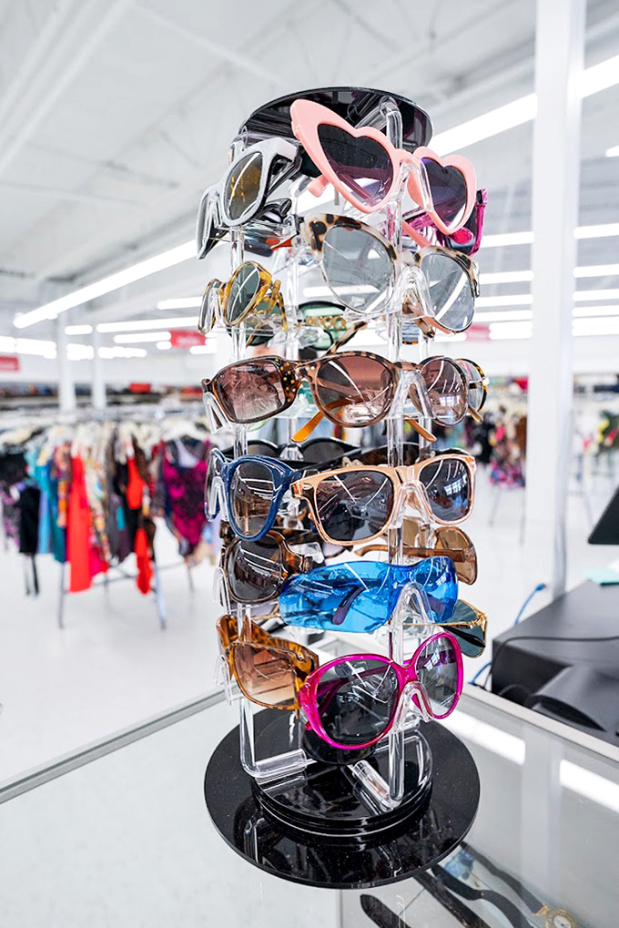 The sunglasses carousel &ndash; a spinning tower of personality where you can try on new identities for less than lunch.