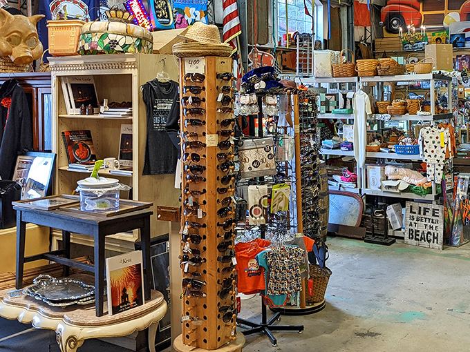 A rotating display of sunglasses stands sentinel among beach-themed merchandise&mdash;because even your vacation style deserves a vintage twist.