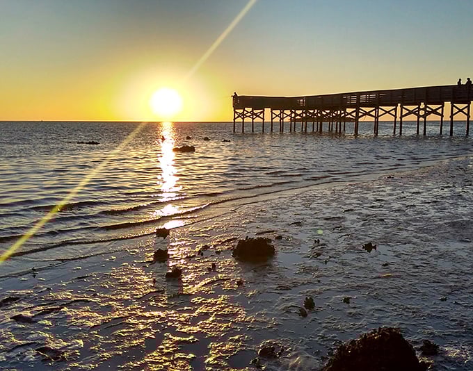 That magical moment when the sun takes its final bow, painting the Gulf waters in shades no Instagram filter could ever replicate.