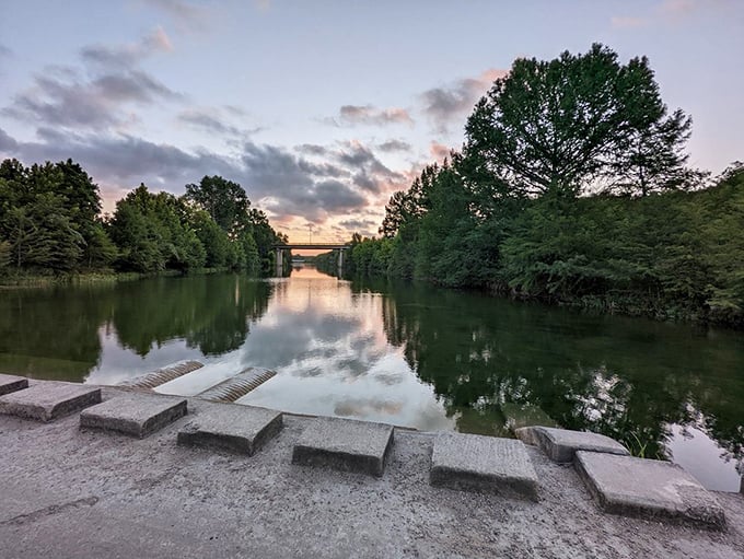 Sunset transforms the Blanco River into liquid gold, creating the kind of moment that makes you forget to check your phone for hours.