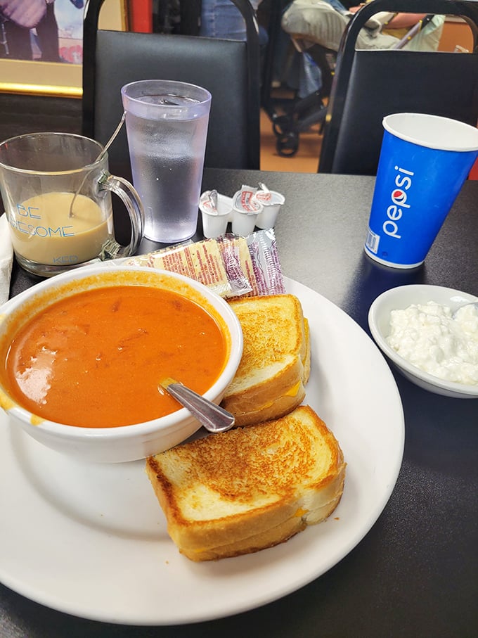 Comfort in a bowl! This tomato soup and grilled cheese combo proves that sometimes the simplest meals are the ones that speak directly to your soul.