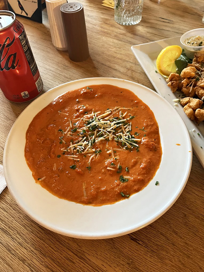 This tomato soup isn't just red liquid in a bowl&mdash;it's comfort, nostalgia, and the perfect companion to a rainy Florida afternoon.