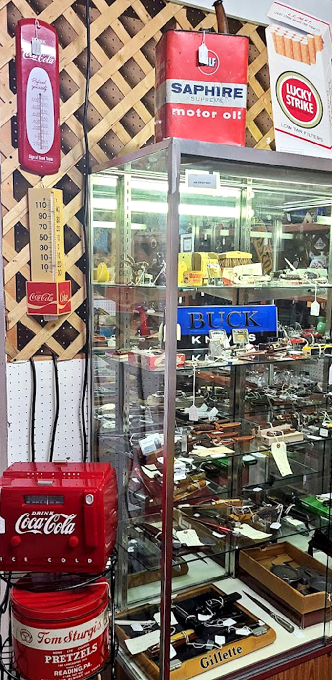 Vintage advertising signs that once hawked Saphire motor oil and Lucky Strike cigarettes now serve as colorful time capsules of Americana.