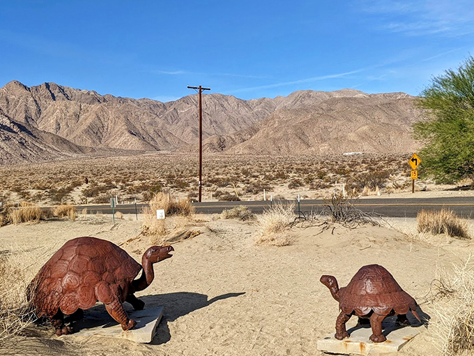 Parent and child tortoises inch their way through eternity, their metal shells weathering the desert elements just like their living counterparts.