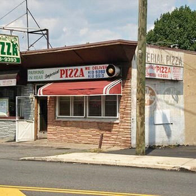 The view from the street reveals Imperial's humble charm&mdash;a pizza joint that's survived on quality, not curb appeal.