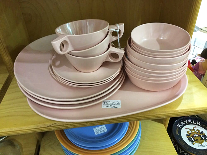 Vintage pink melamine dishes that scream "1950s optimism" while whispering "I'll never break in the dishwasher." Mid-century durability meets atomic age style.
