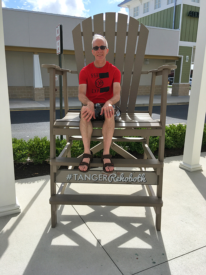 The iconic oversized Adirondack chair offers weary shoppers a moment of whimsy and the perfect Instagram opportunity to prove you conquered Tanger.