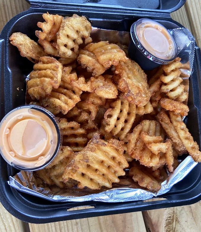 Waffle fries with attitude&mdash;crispy, seasoned, and served with dipping sauce that makes you wonder why regular fries even exist.