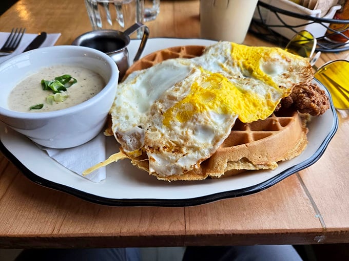 Waffles playing the perfect stage for sunny-side-up eggs. With a side of creamy soup, it's breakfast's answer to the perfect buddy comedy.