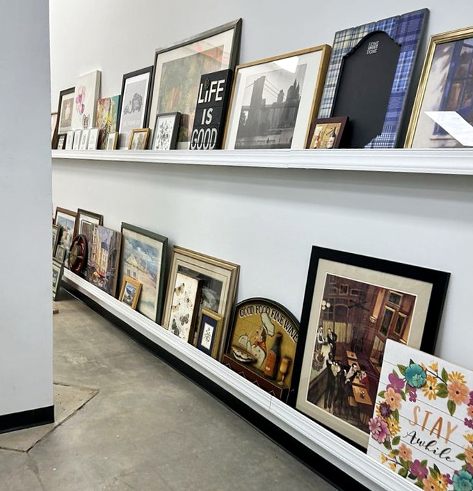 Picture frames lined up like a gallery opening where "Life Is Good" becomes your decorating philosophy.