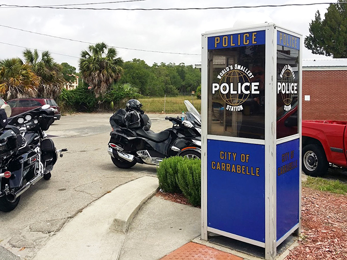 Bikers make the pilgrimage too, proving this tiny blue box has massive appeal across all forms of transportation.