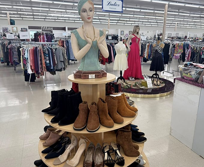 Footwear displayed with department store flair. Those boots weren't made just for walking&mdash;they were made for saving money.