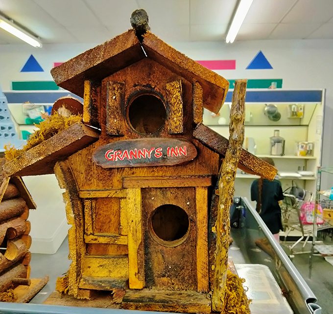"Granny's Inn" birdhouse brings rustic charm that'll make your backyard birds feel like they're vacationing somewhere special.