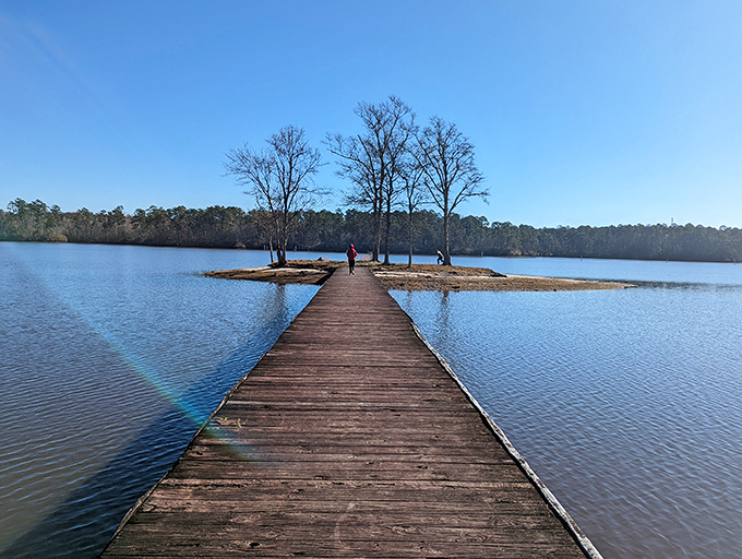 The wooden walkway stretches toward a tiny island that feels like your own private kingdom&mdash;at least until the next family arrives with their picnic basket.