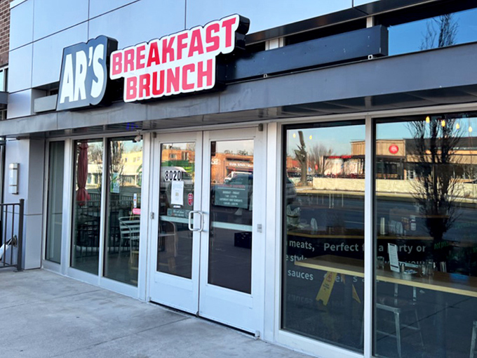 Sleek glass and modern design frame the timeless art of breakfast done right in contemporary Overland Park.