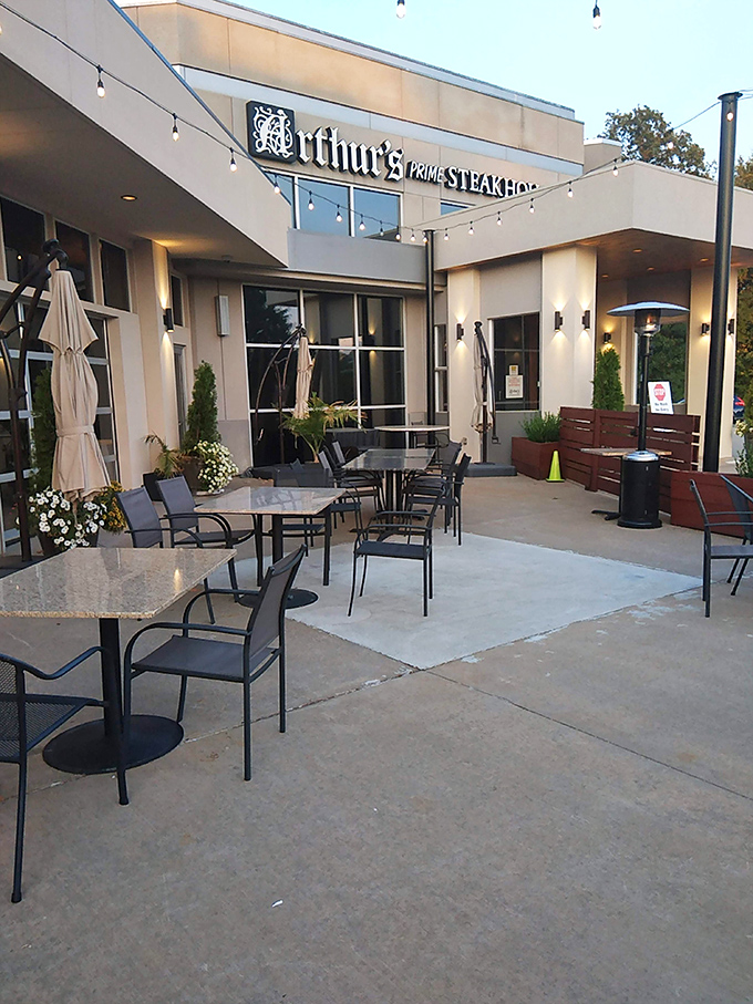Arthur's modern patio invites you to enjoy your steak under Arkansas skies. String lights included, food coma inevitable.