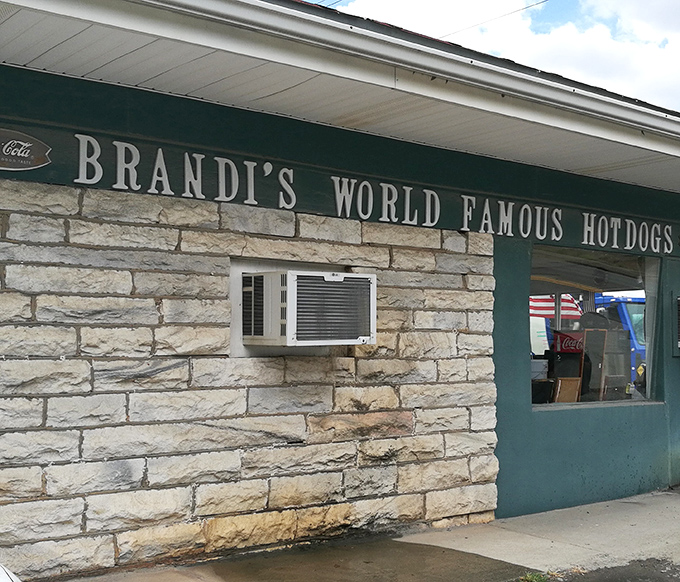 Stone walls and vintage charm create the perfect backdrop for hot dogs that live up to their "world famous" billing.