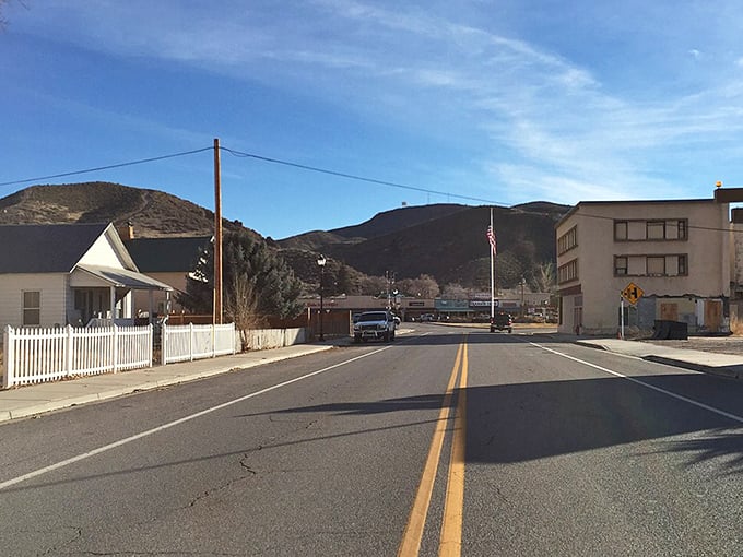 A peaceful afternoon in Caliente, Nevada, where quiet streets, warm sunshine, and nearby hills make small-town life feel inviting.