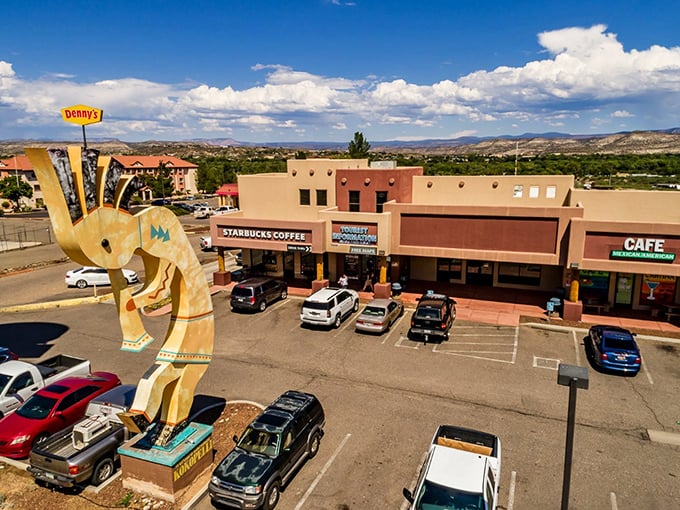 Camp Verde's kokopelli sculpture welcomes visitors to this affordable desert gem. Southwestern charm with practical amenities!