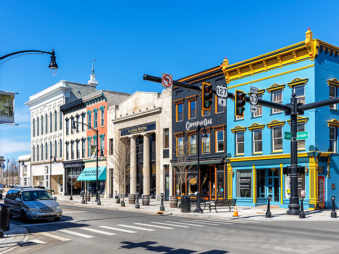 Those colorful storefronts line up like a box of crayons, each one adding its own vibrant personality.