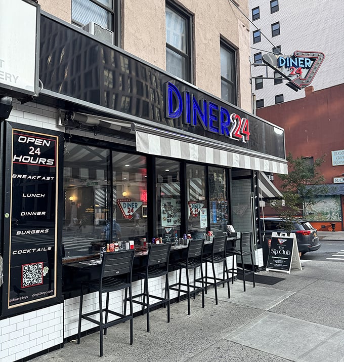 Diner 24's sleek black exterior promises round-the-clock comfort food whenever cravings strike hard.