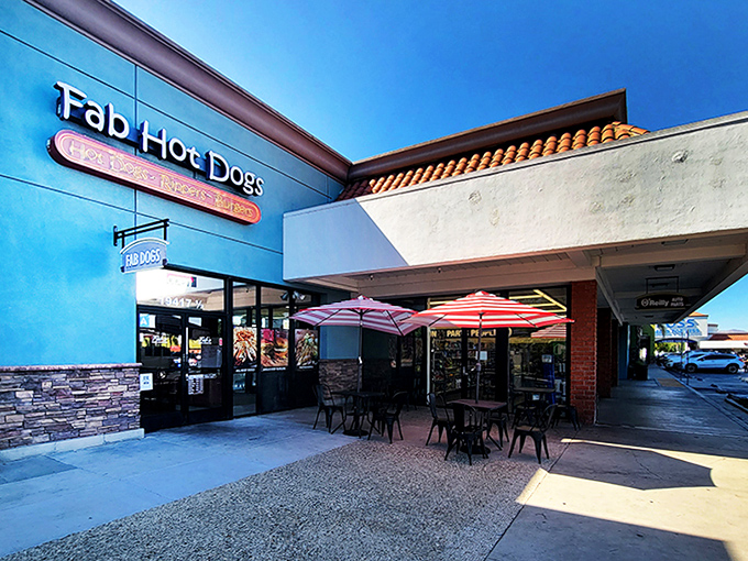 Fab Hot Dogs' cheerful blue exterior radiates Valley optimism where bacon-wrapped dreams become delicious reality.