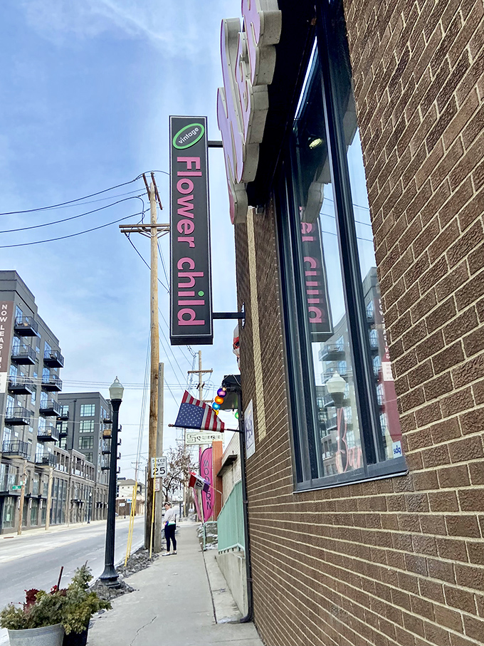 Flower Child's colorful signage and brick charm whisper "groovy vintage treasures" to passing Columbus street wanderers.