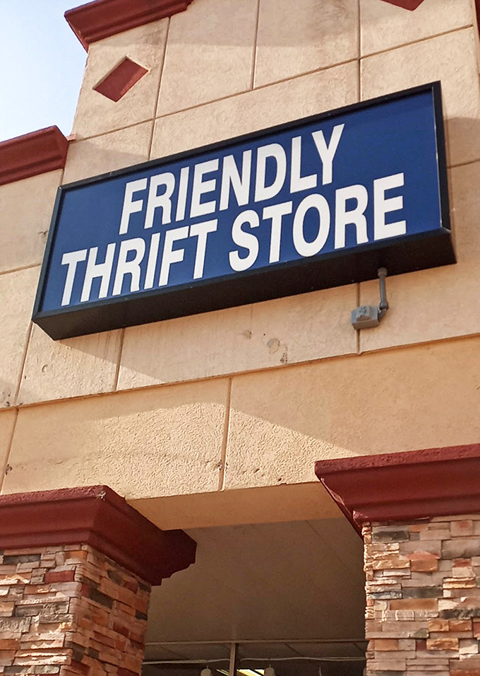 The Friendly Thrift Store sign tells the truth&mdash;walk in a stranger, shop like family, leave with treasures and smiles.