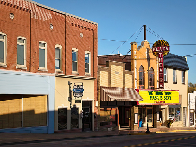 Vintage storefronts and faded advertisements tell stories of a town where history costs less than headlines.