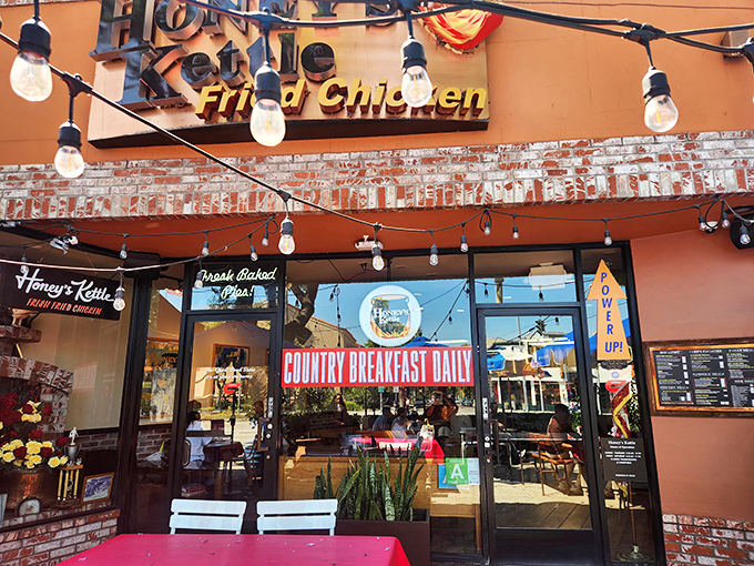 Honey's Kettle's charming brick-and-string-light aesthetic is as warm and inviting as their perfectly golden fried chicken.