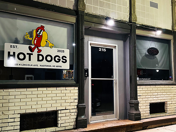 Hot Dogs in Hastings keeps it simple with their cheerful mascot. Sometimes the straightforward approach is the tastiest!