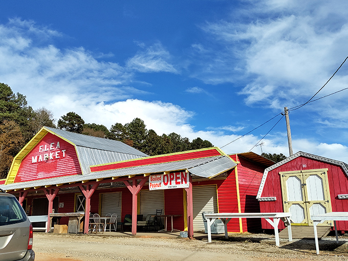 Red barn charm meets serious flea market business in this picturesque setup that feels like visiting your favorite country cousin.