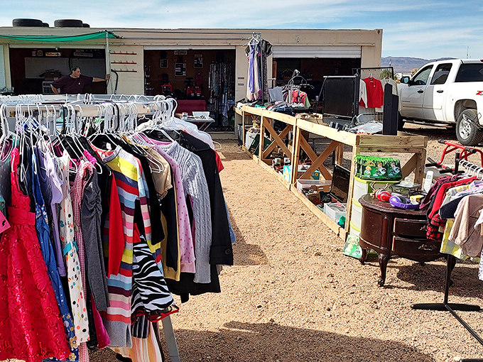 Western wear with authentic flair! These racks of clothing offer both practical desert attire and a touch of cowboy style.